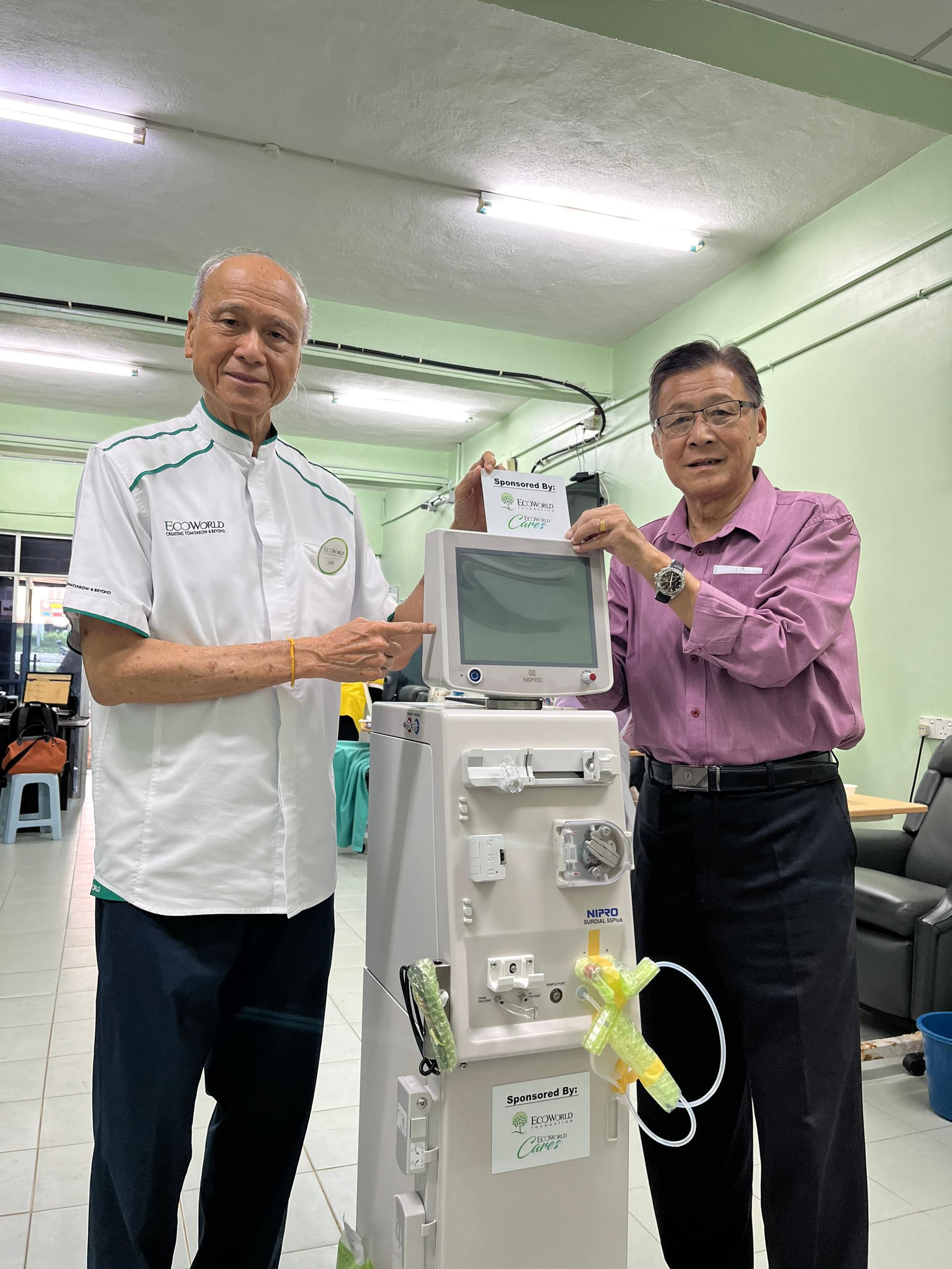 Tan Sri Lee Lam Thye, Chairman of Eco World Foundation, handing over a ...